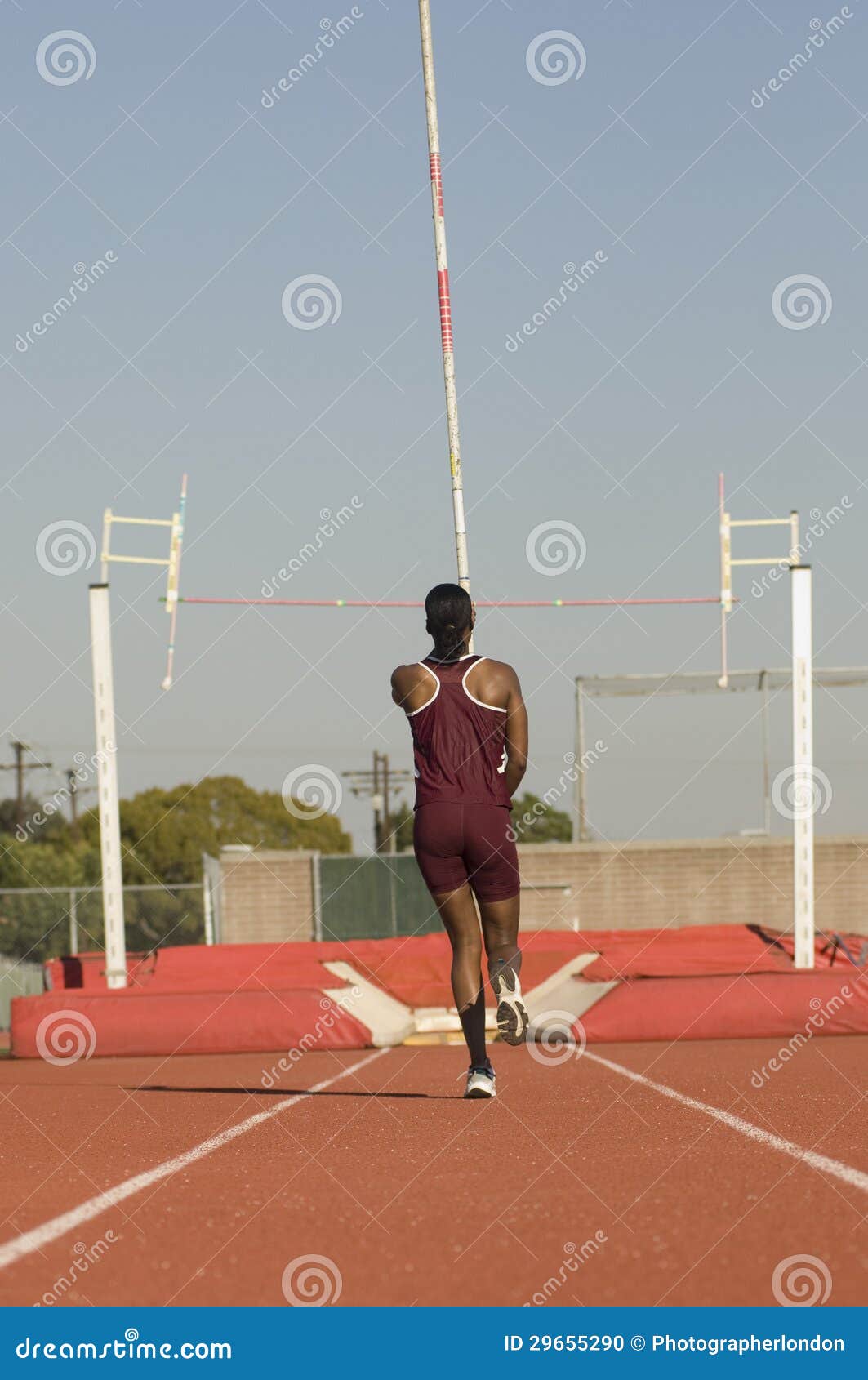 Pole Vaulter Running with Pole Stock Photo - Image of african, full ...