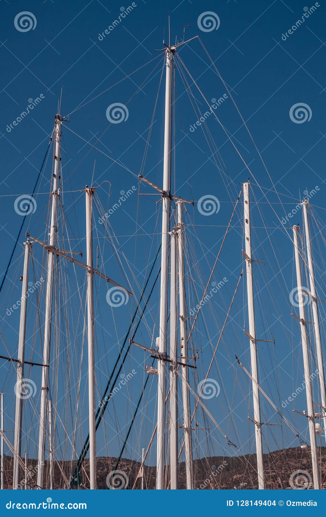 Poles of Sailing Yachts Against Blue Sky Background Stock Photo - Image ...