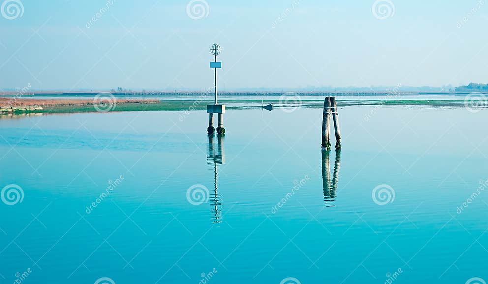 Poles in the water stock image. Image of horizon, serene - 38036143