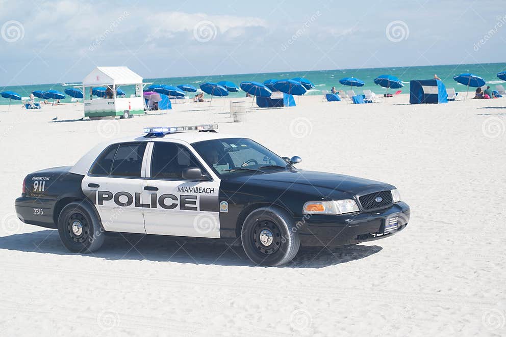 Police car on the beach editorial stock photo. Image of door - 85650128
