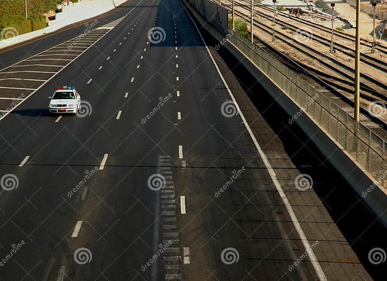 Police car on empty road stock image. Image of holiday - 281971