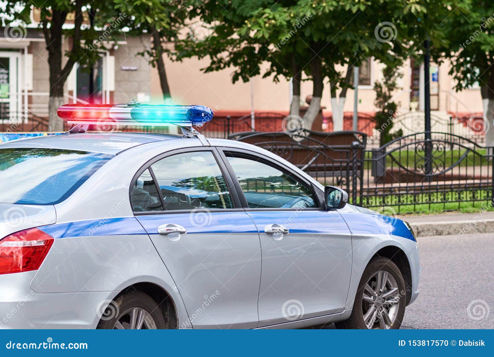 Police Car with Lights Turned on in the City Stock Photo - Image of ...