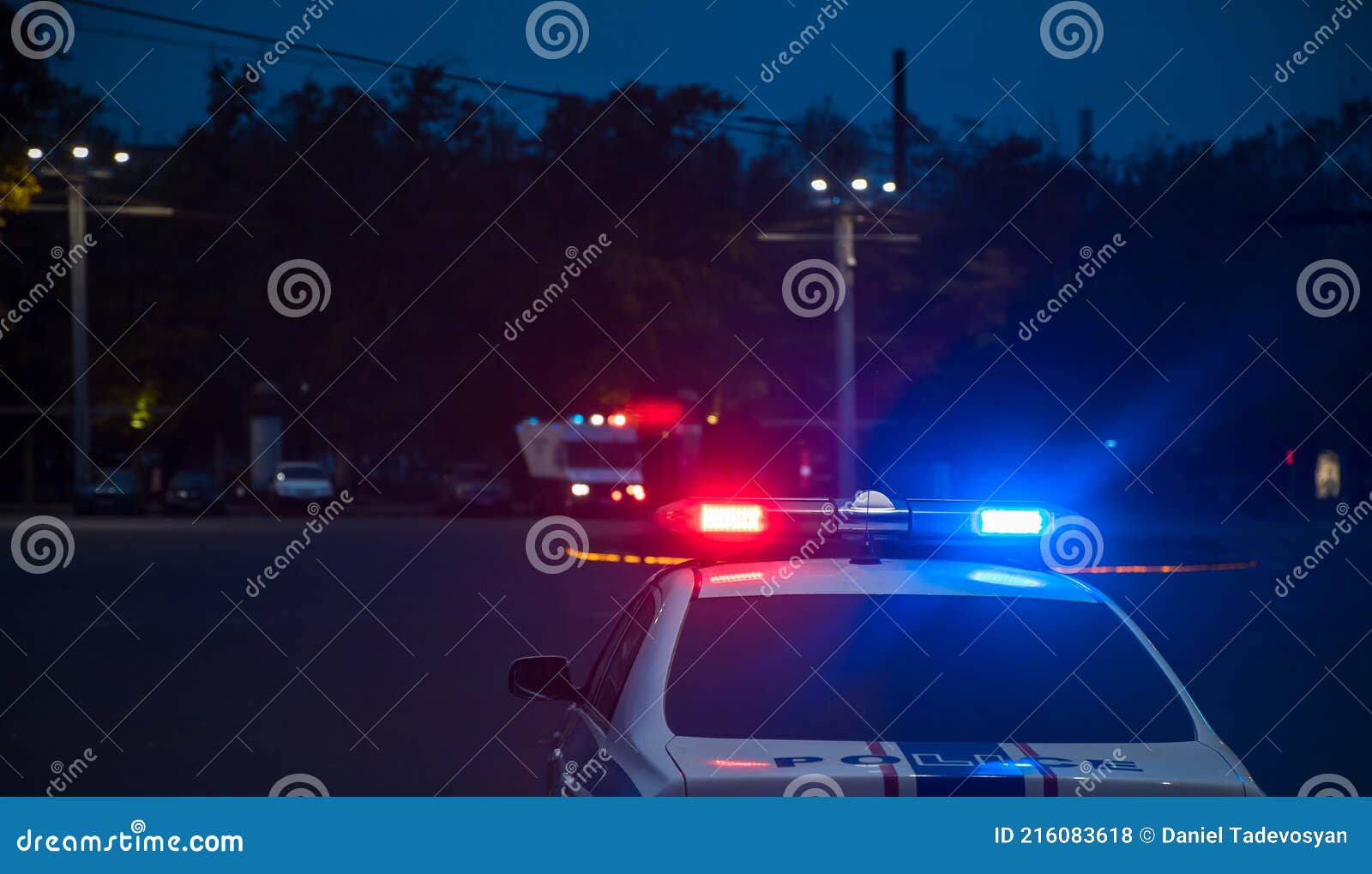 Police car at night stock photo. Image of blue, urban - 216083618