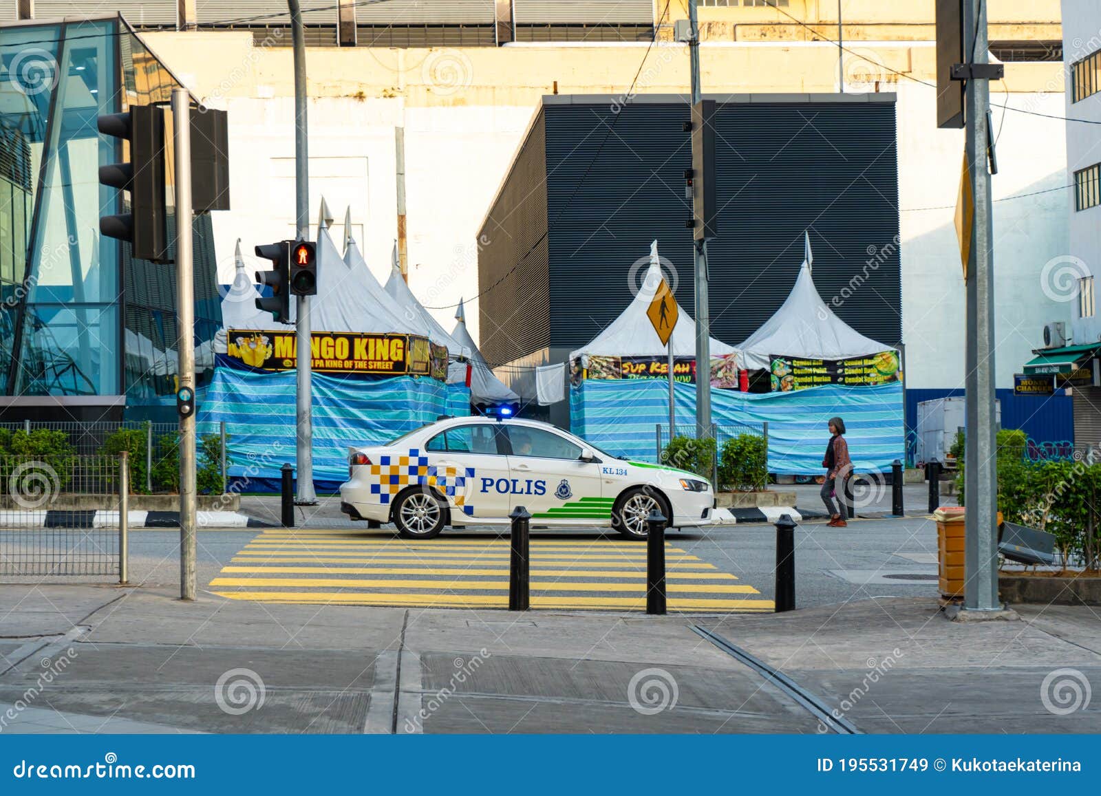 A Police Car is Parked in the Middle of a Pedestrian Crossing. Police ...