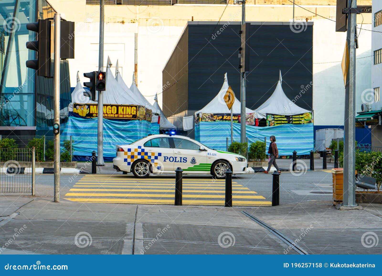 A Police Car is Parked in the Middle of a Pedestrian Crossing. Police ...