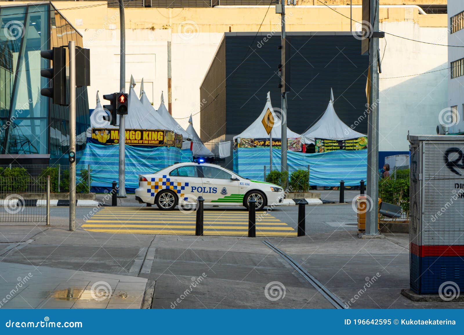 A Police Car is Parked in the Middle of a Pedestrian Crossing. Police ...