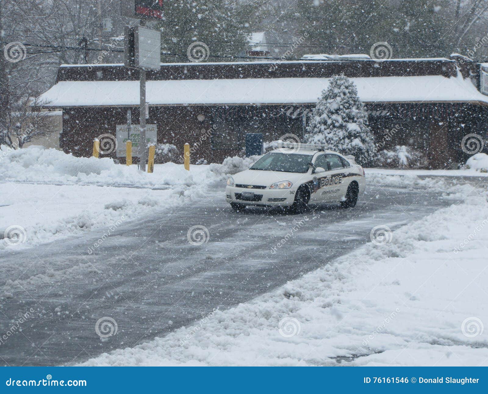 Police Car during Snow editorial photo. Image of snowfall - 76161546
