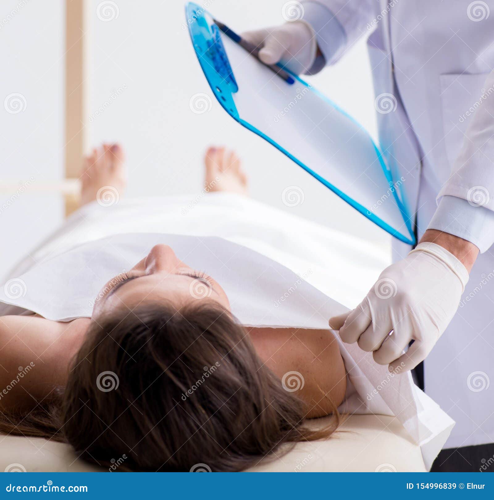 Police Coroner Examining Dead Body Corpse in Morgue Stock Image - Image ...