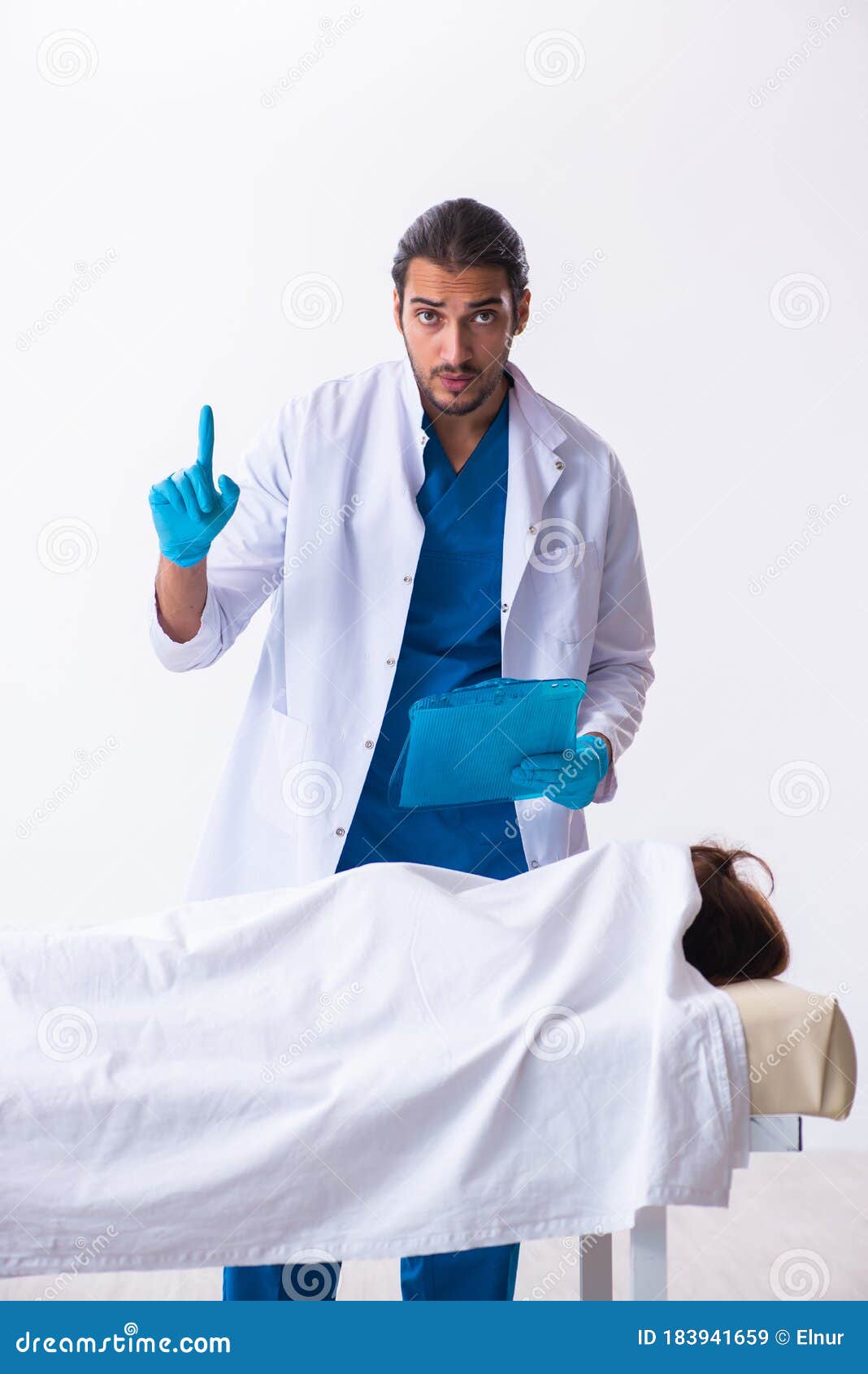 Police Coroner Examining Dead Body Corpse in Morgue Stock Image - Image ...