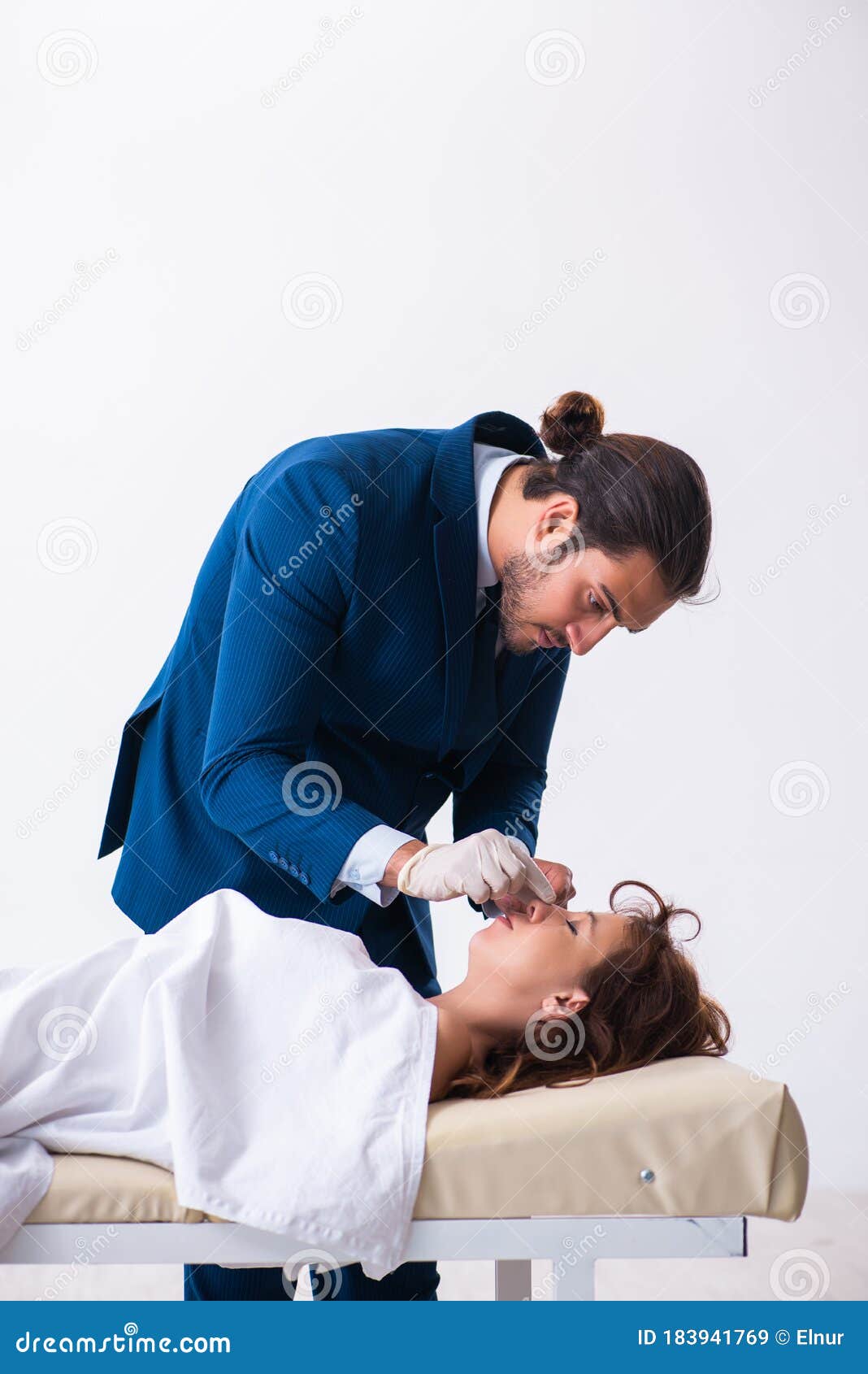 Police Coroner Examining Dead Body Corpse in Morgue Stock Image - Image ...