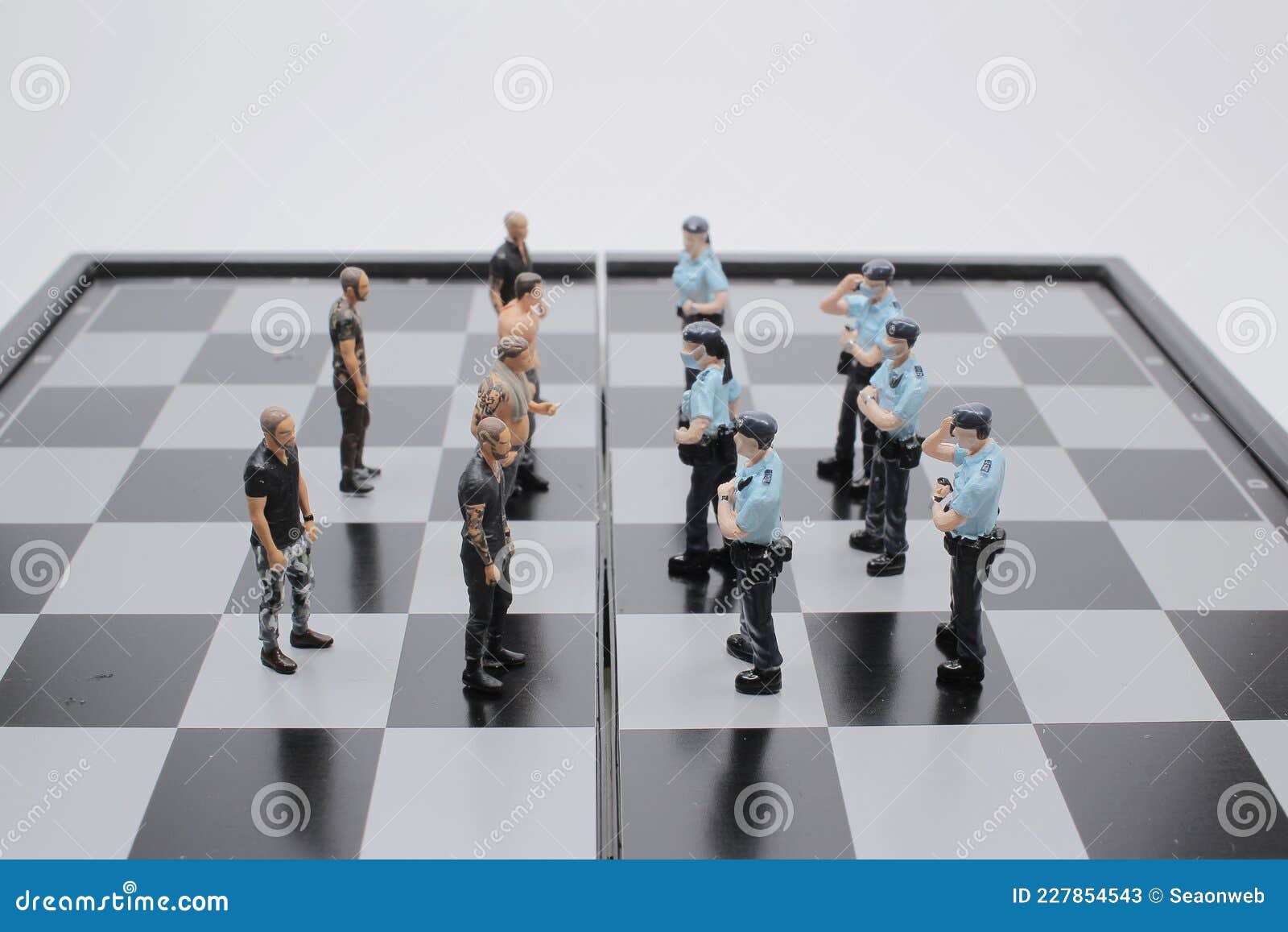 A Police Figure and Gang Members on the Chess Board Stock Image - Image ...