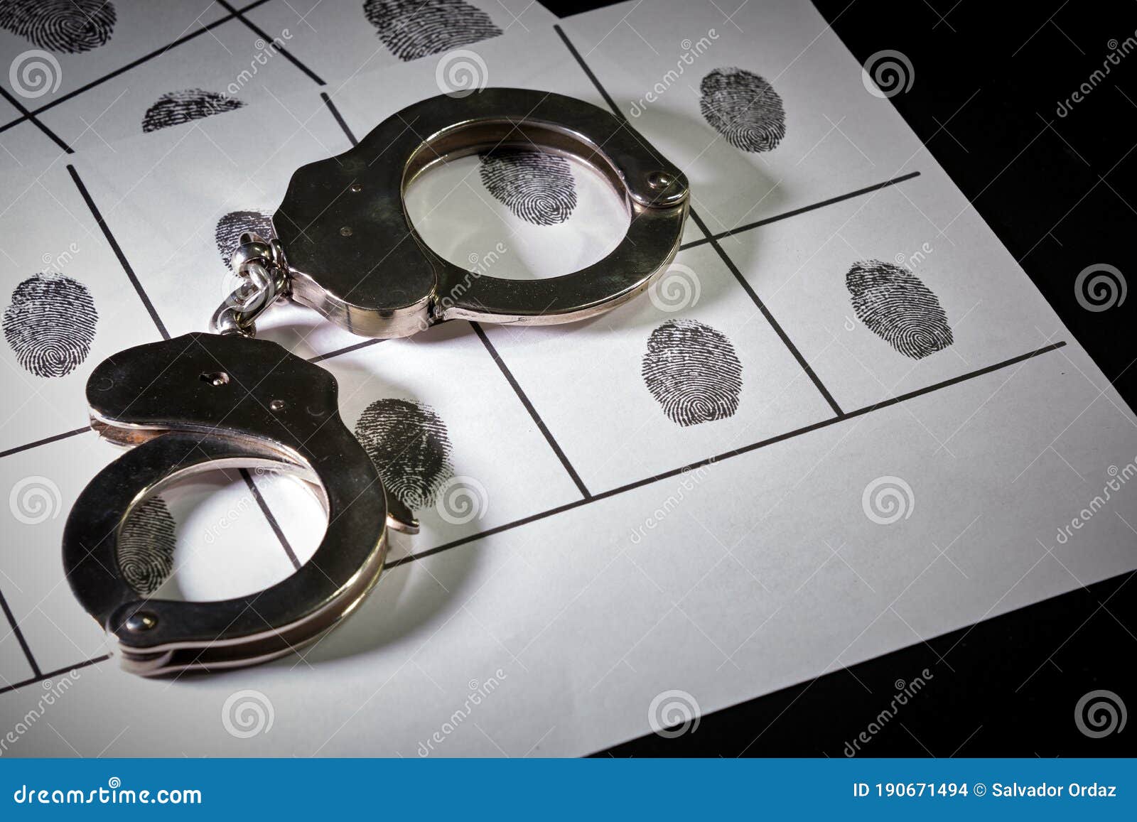 Police Handcuffs on Fingerprint Sheet Stock Photo - Image of inspector ...
