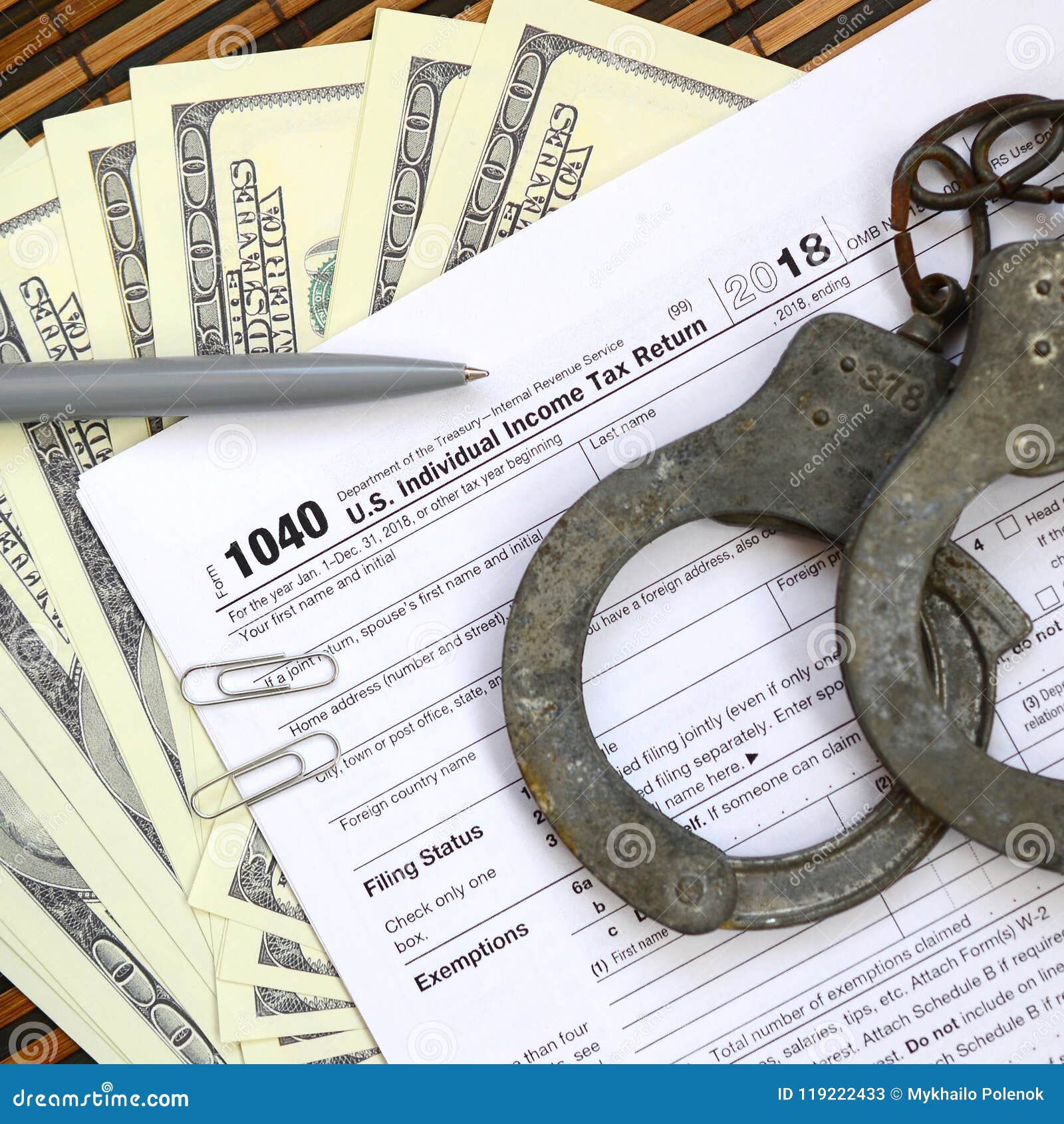 Police Handcuffs Lie on the Tax Form 1040. the Concept of Proble ... Police Handcuffs Lie on the Tax Form 1040. the Concept of Proble ...