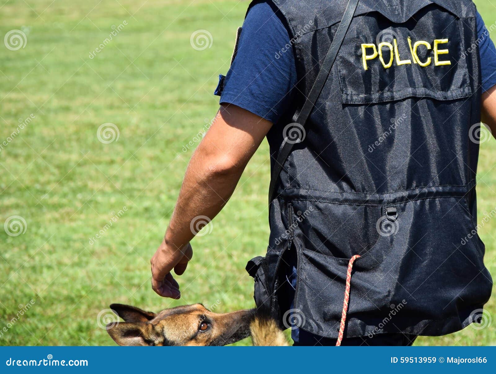 Police man with his dog stock image. Image of patrol - 59513959