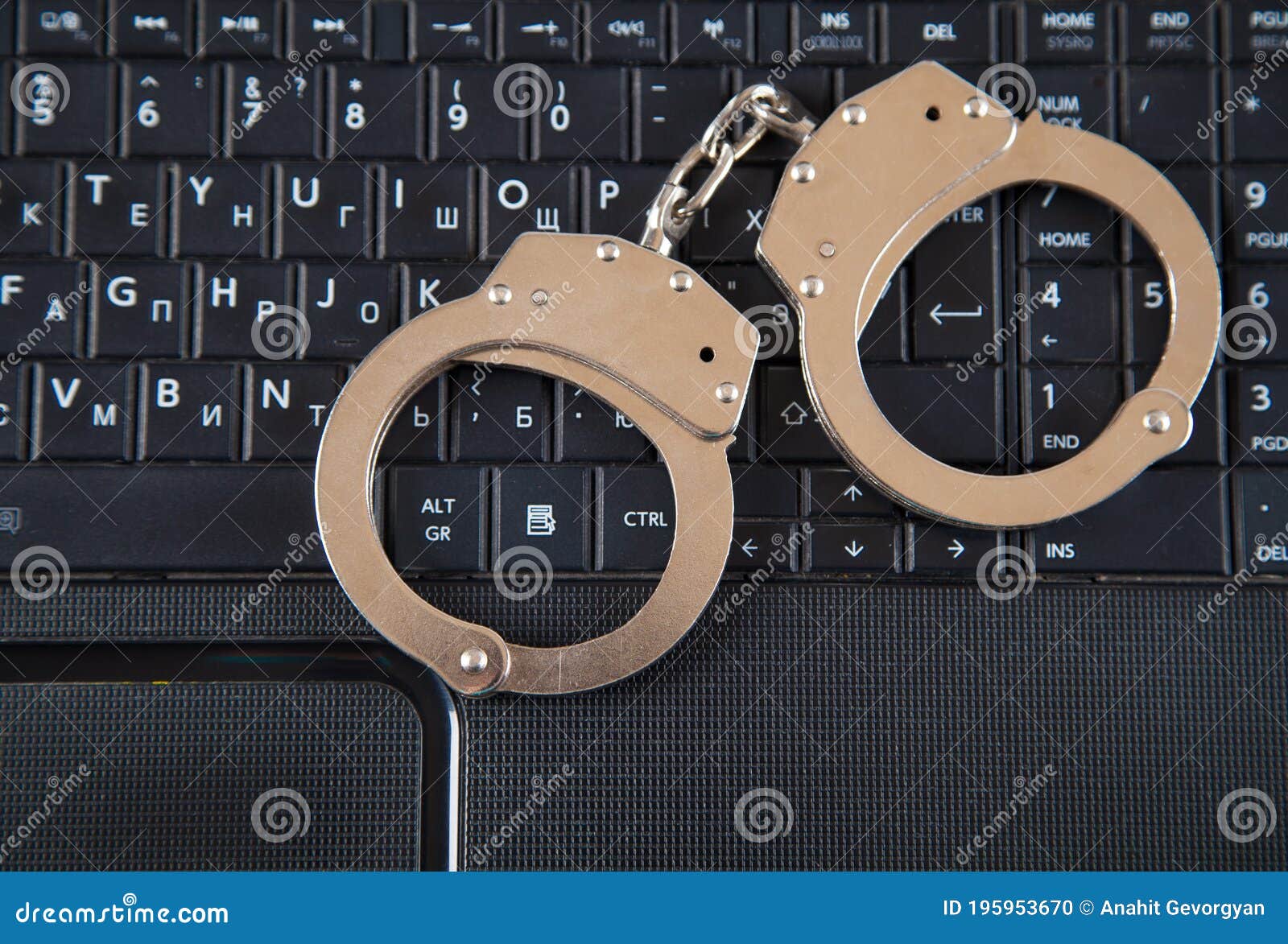 Police Metal Handcuffs and Computer Keyboard Stock Photo - Image of ...