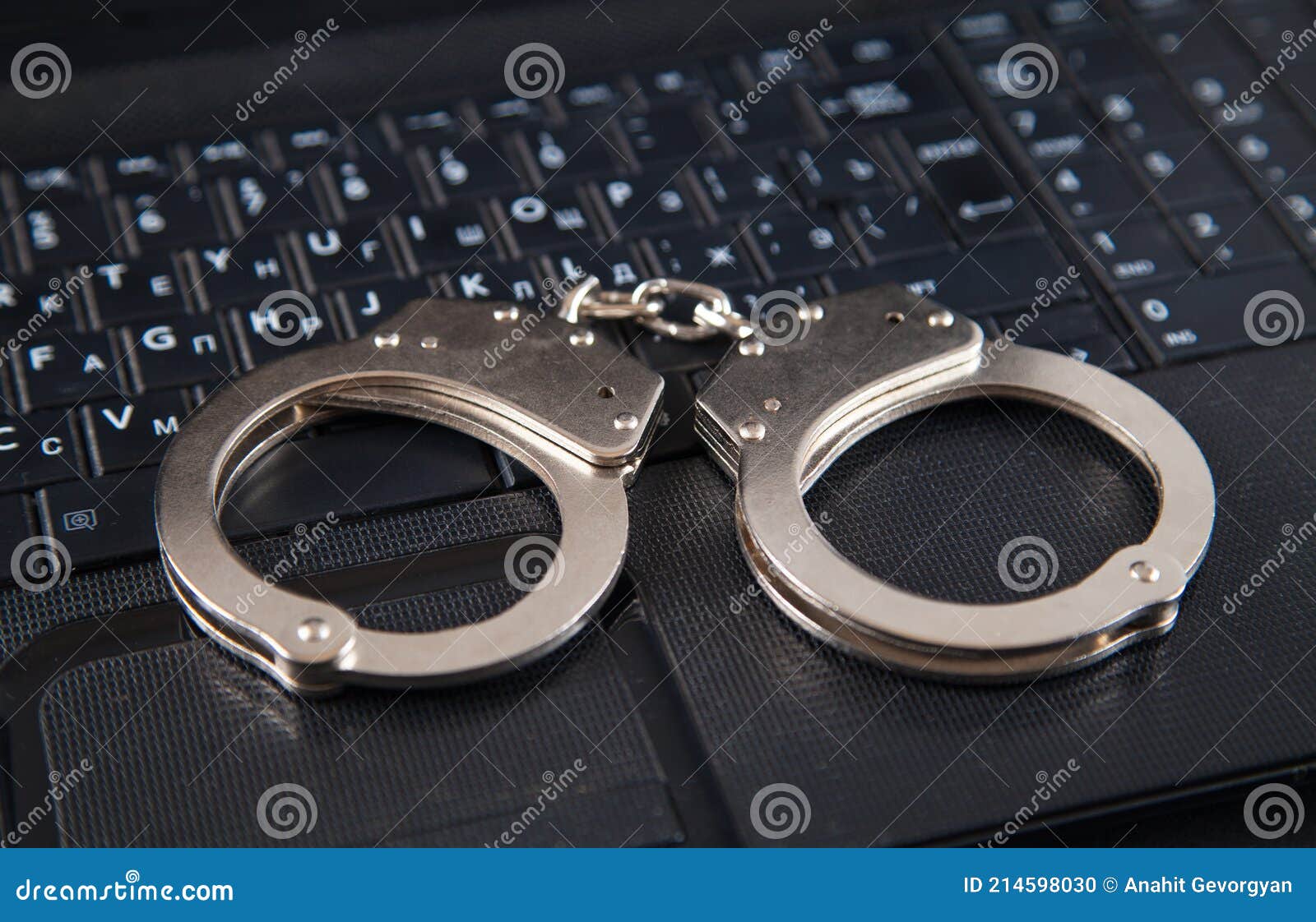 Police Metal Handcuffs and Computer Keyboard Stock Photo - Image of ...