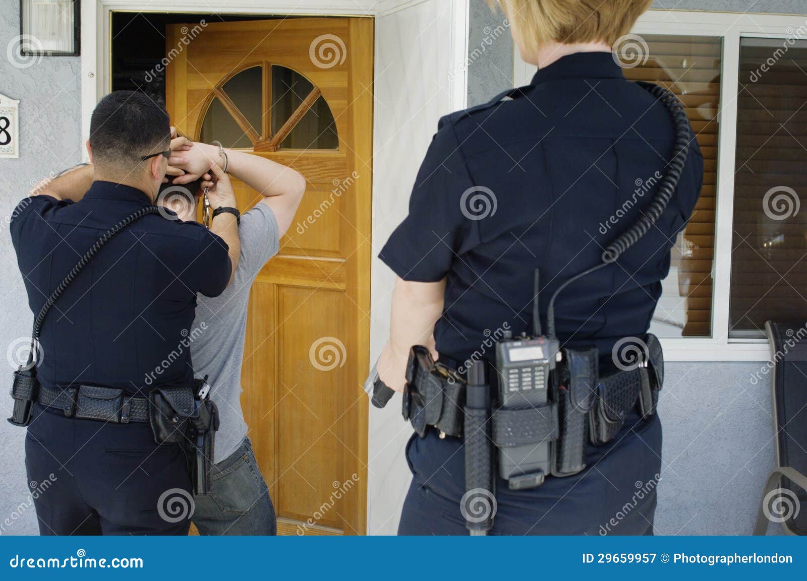 Police Officer Arresting Young Man Stock Image - Image of arrested ...