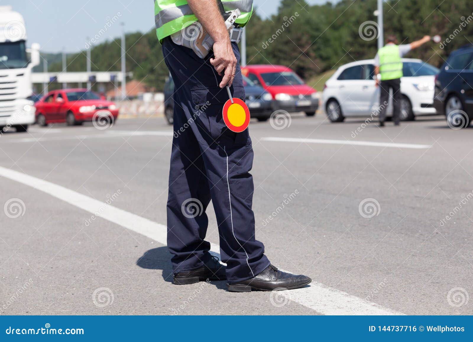 Police Officer Controlling Traffic on the Highway Stock Photo - Image ...