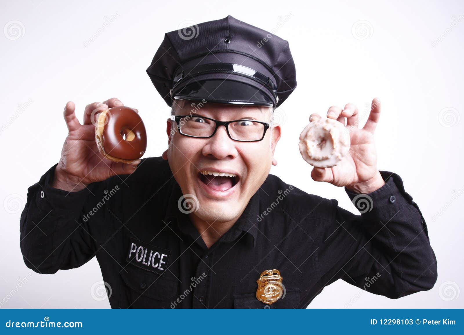 Police officer with donuts stock image. Image of adult - 12298103