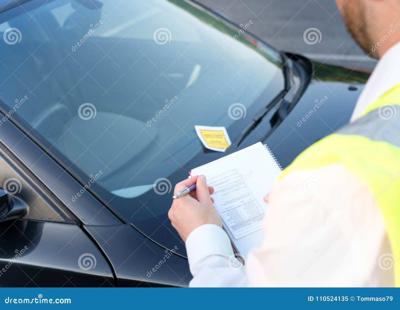 Police Officer Giving a Fine for Parking Violation Stock Image - Image ...