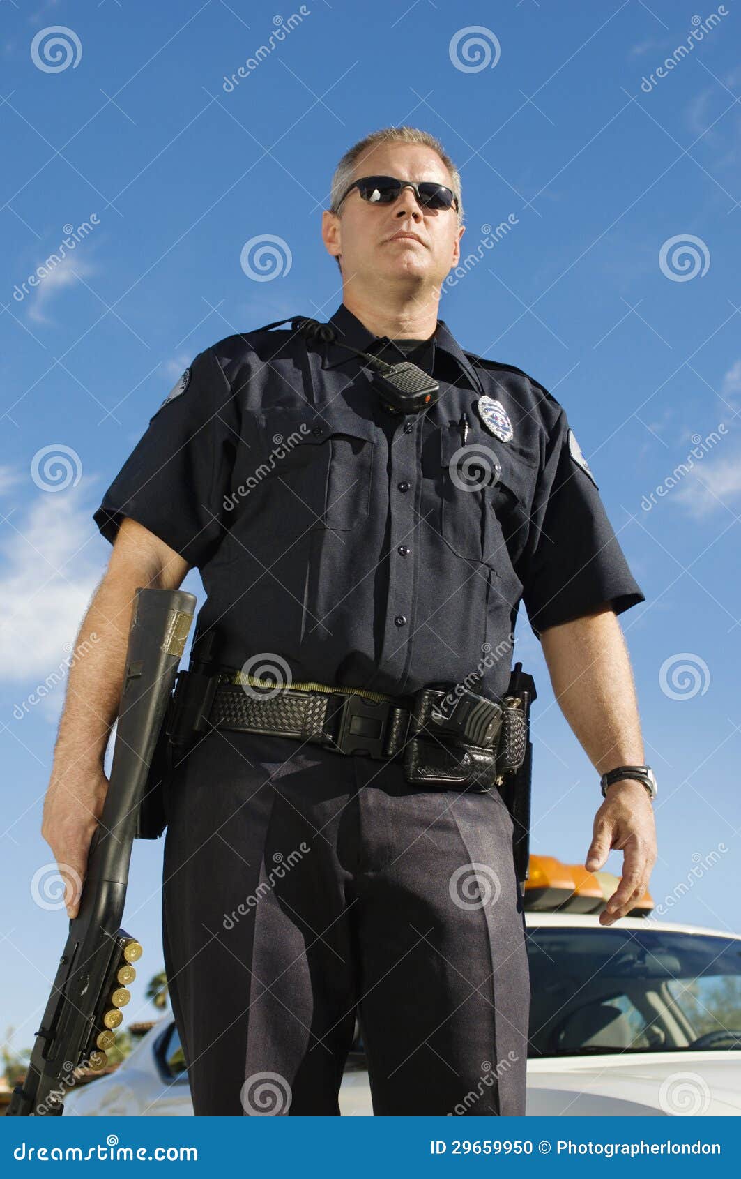 Police Officer Holding Weapon Stock Photo - Image of policeman ...