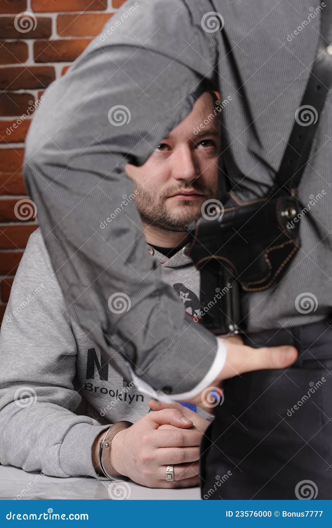 Police Officer Interrogates Detainee Stock Photo - Image of questioning ...