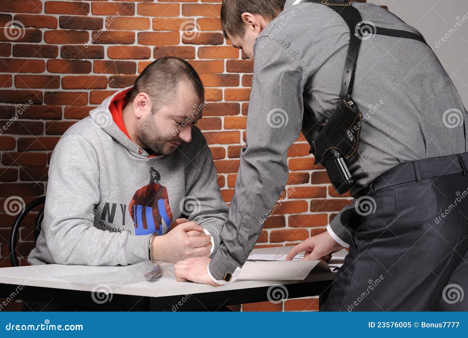 Police Officer Interrogates Detainee Stock Image - Image of questioning ...