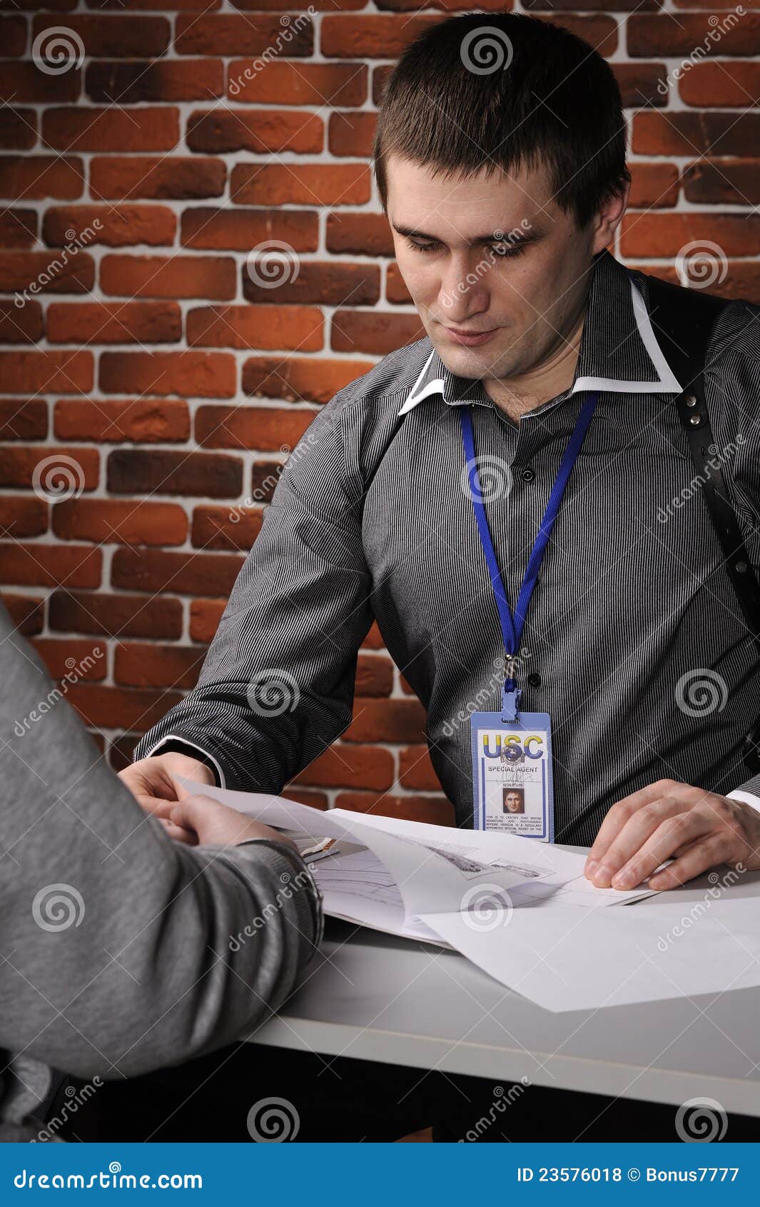 Police Officer Interrogates Detainee Stock Photo - Image of ...