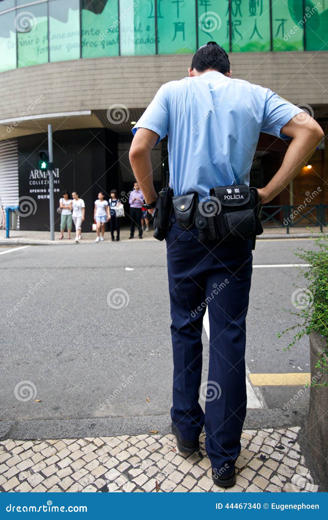 Police officer patrolling editorial image. Image of macanese - 44467340
