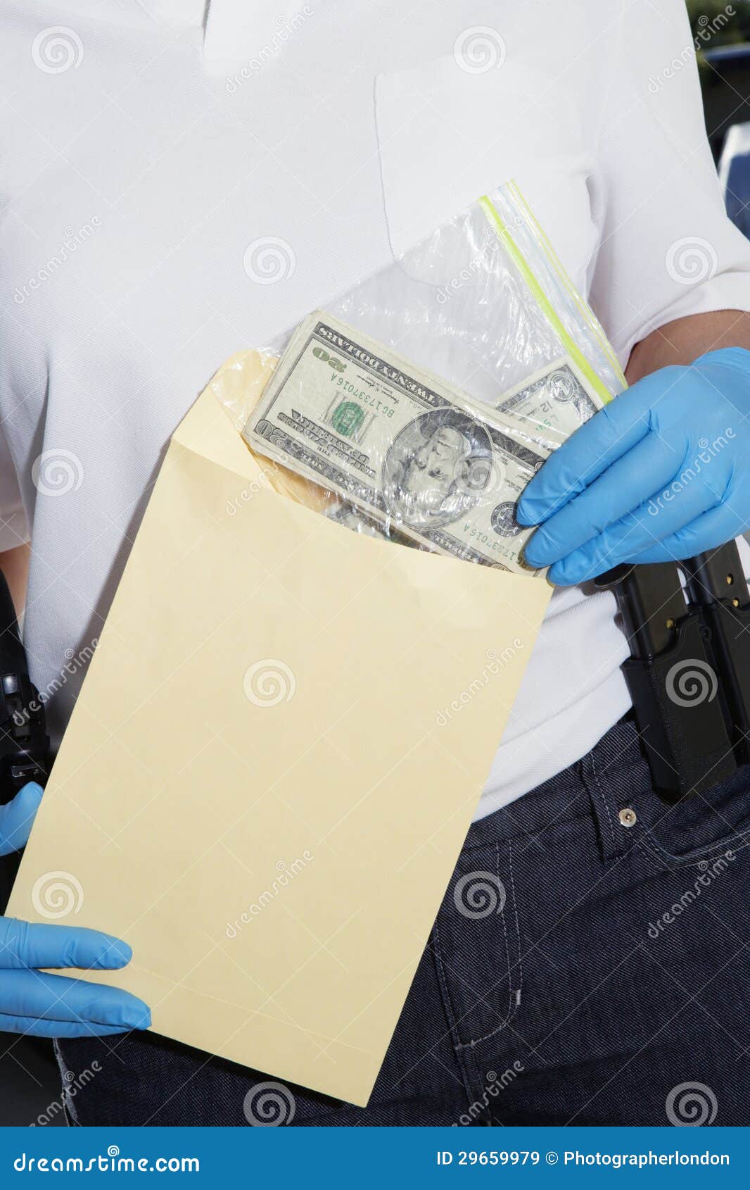 Police Officer Putting Money in Evidence Envelope Stock Image - Image ...
