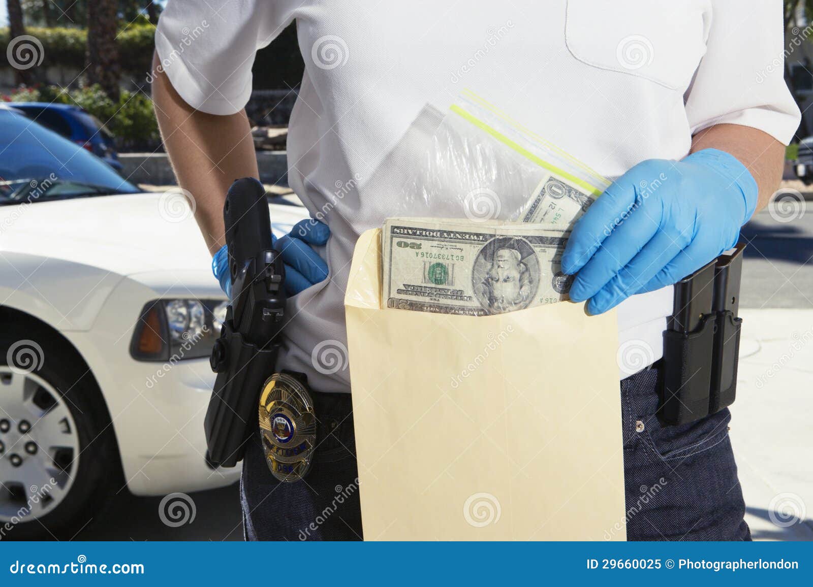 Police Officer Putting Money in Evidence Envelope Stock Image - Image ...