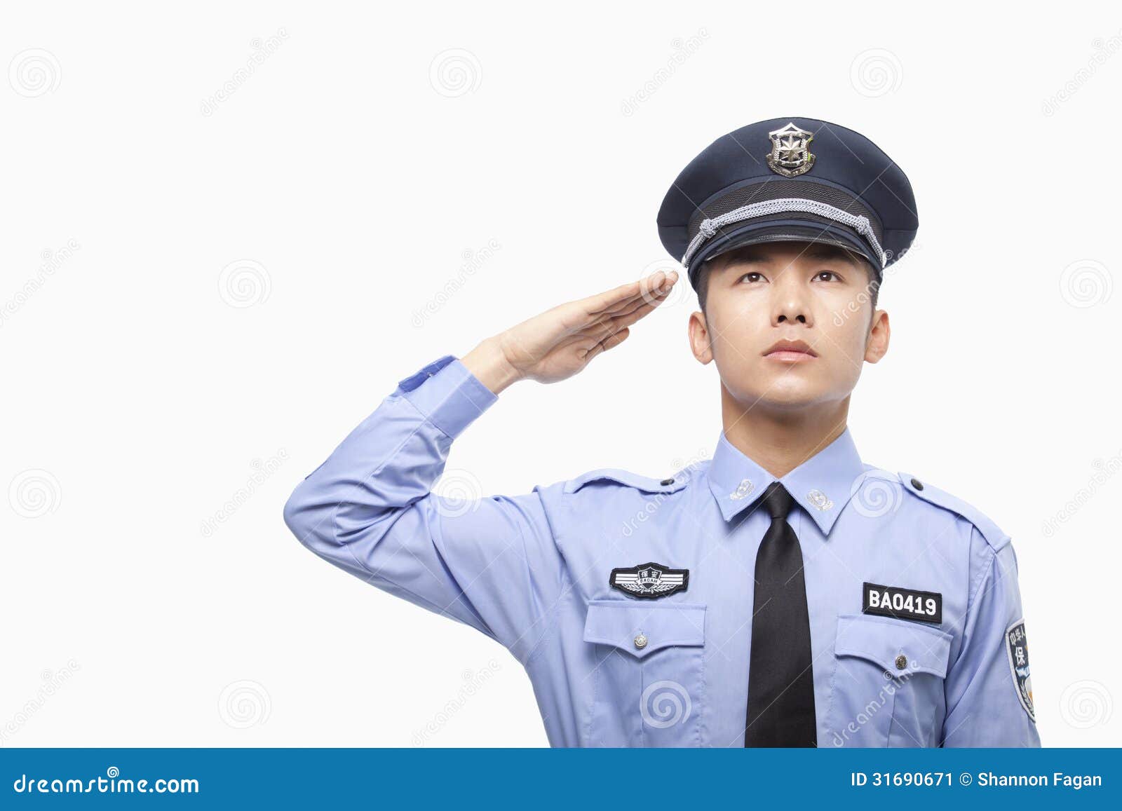 Police Officer Saluting, Studio Shot Stock Image - Image of standing ...