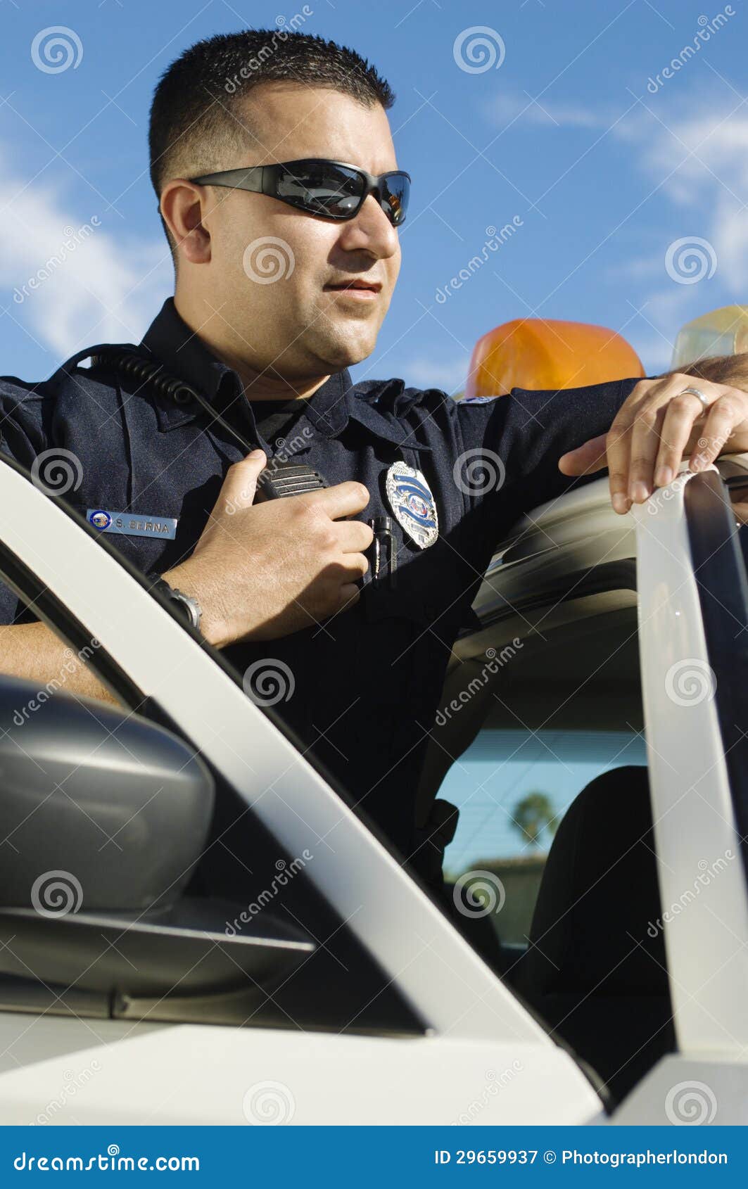 Police Officer Using Two-Way Radio Stock Image - Image of latin ...