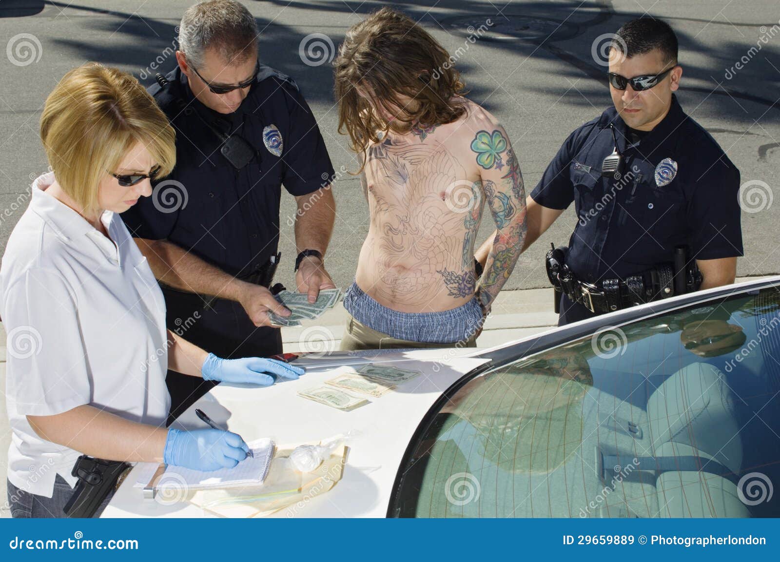 Police Officers Arresting Young Man Stock Image Image Of Coworker