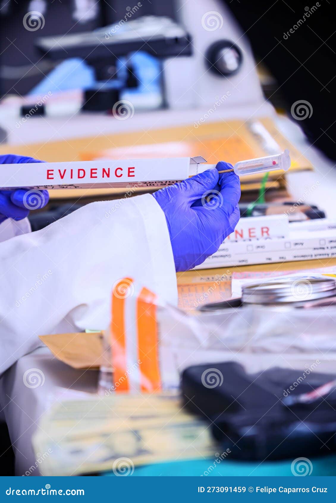 Police Scientist Pulls Out Isope with Sample of Evidence Implicated in ...