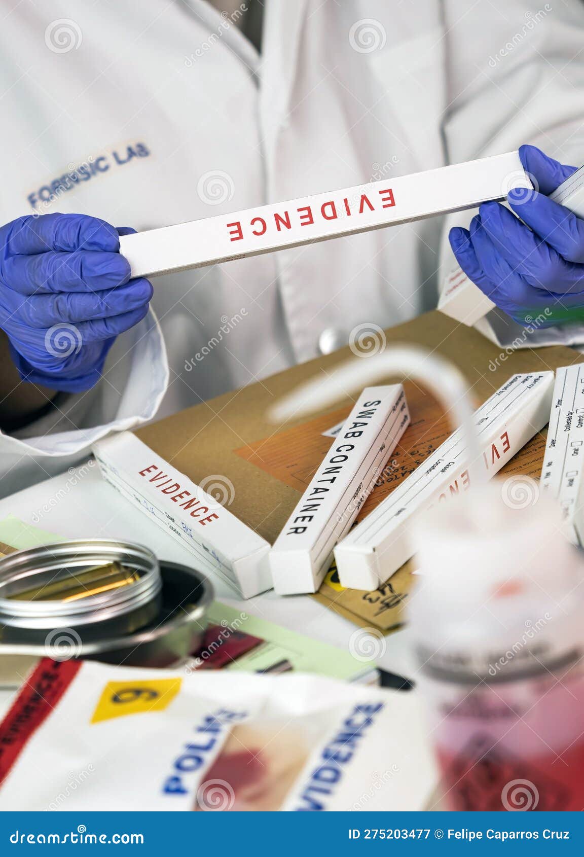 Police Scientist Pulls Out Isope with Sample of Evidence Implicated in ...