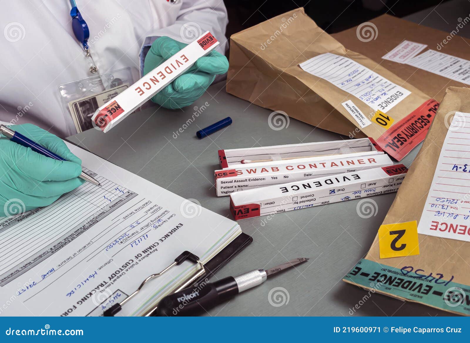 Police Scientist Takes Data from Evidence Box in Crime Lab Stock Image ...