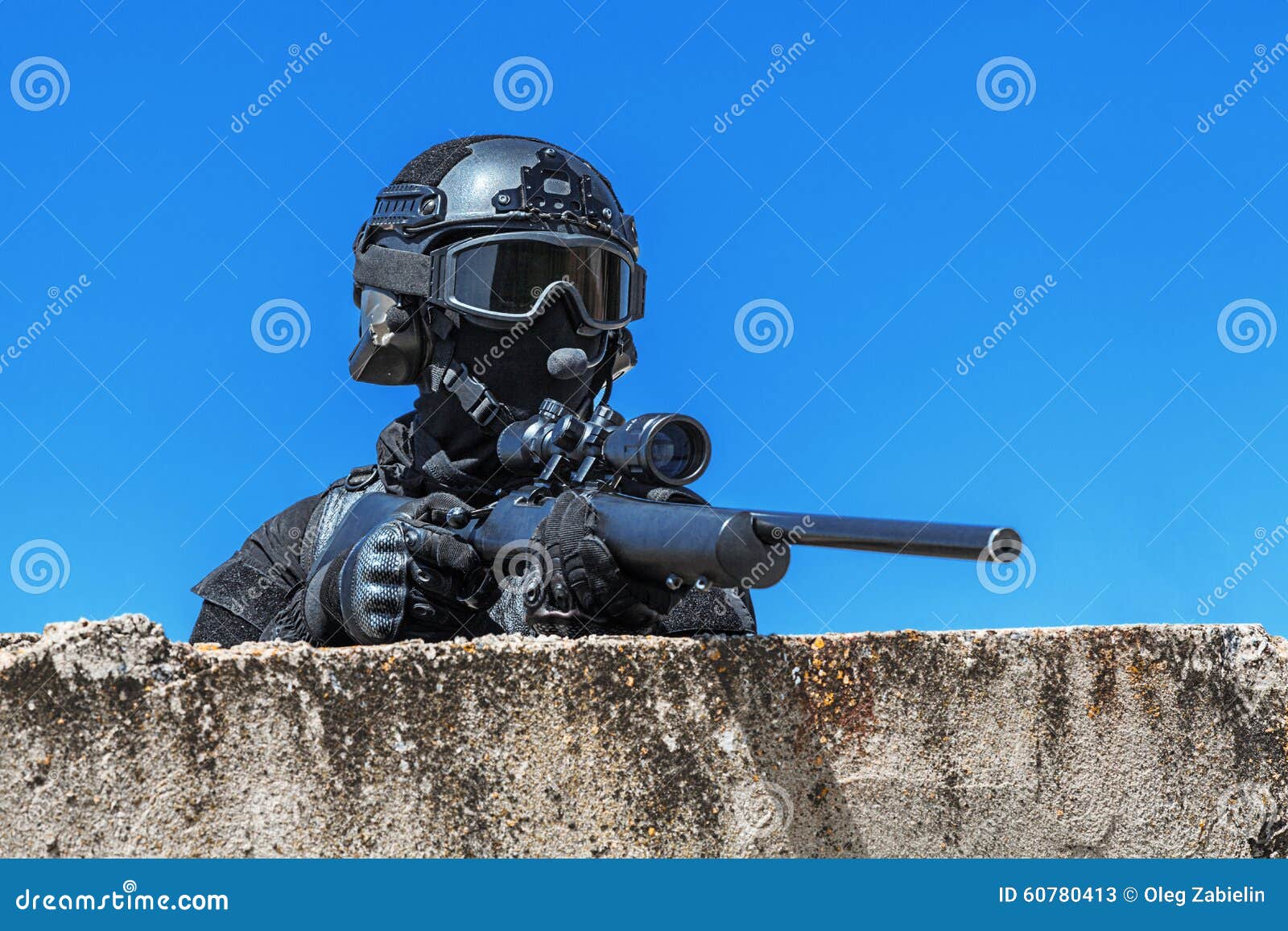 Police Sniper Aiming At The Scope Of His Rifle Stock Photo ...