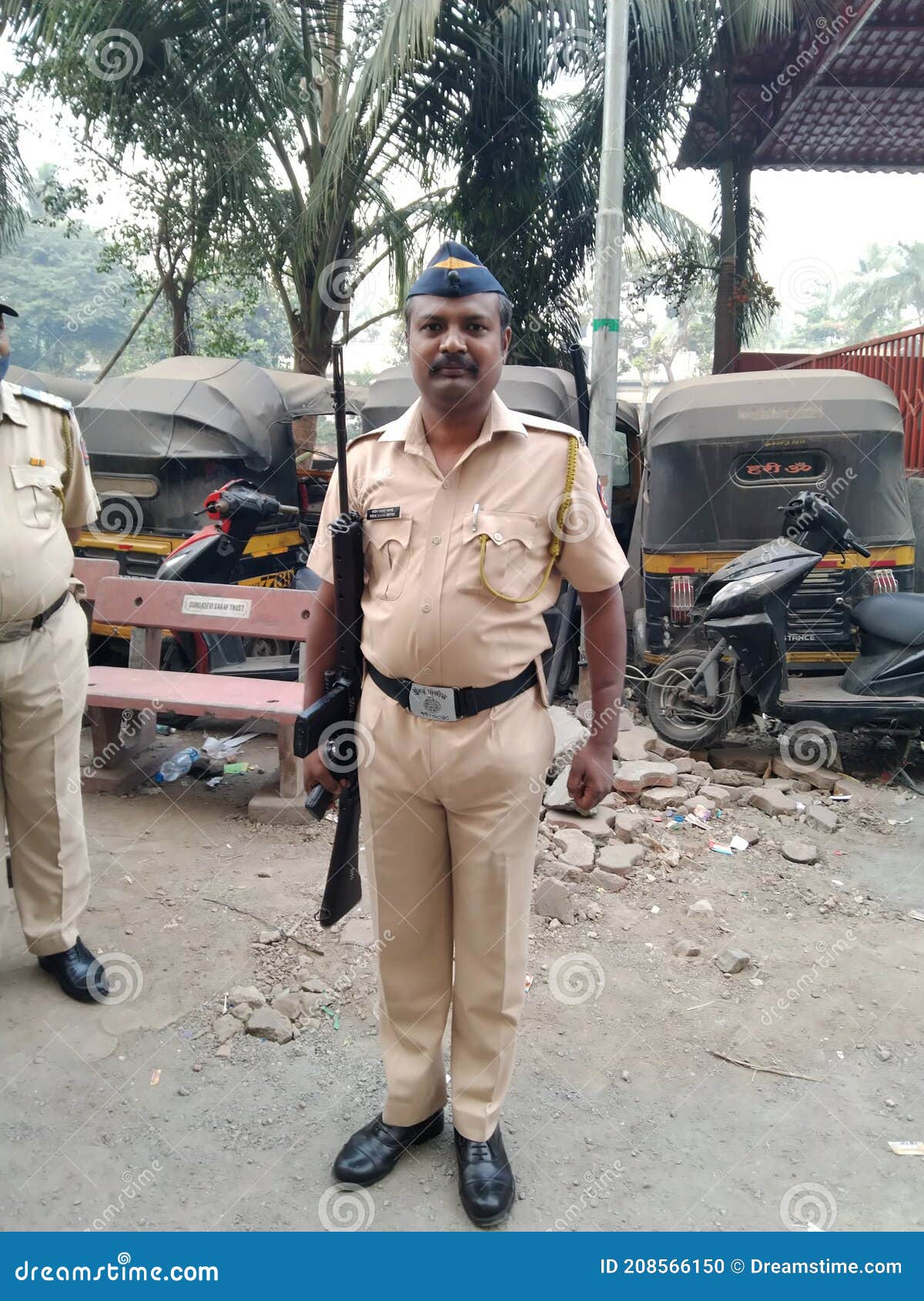Policeman Standing with Holding Gun Editorial Image - Image of person ...