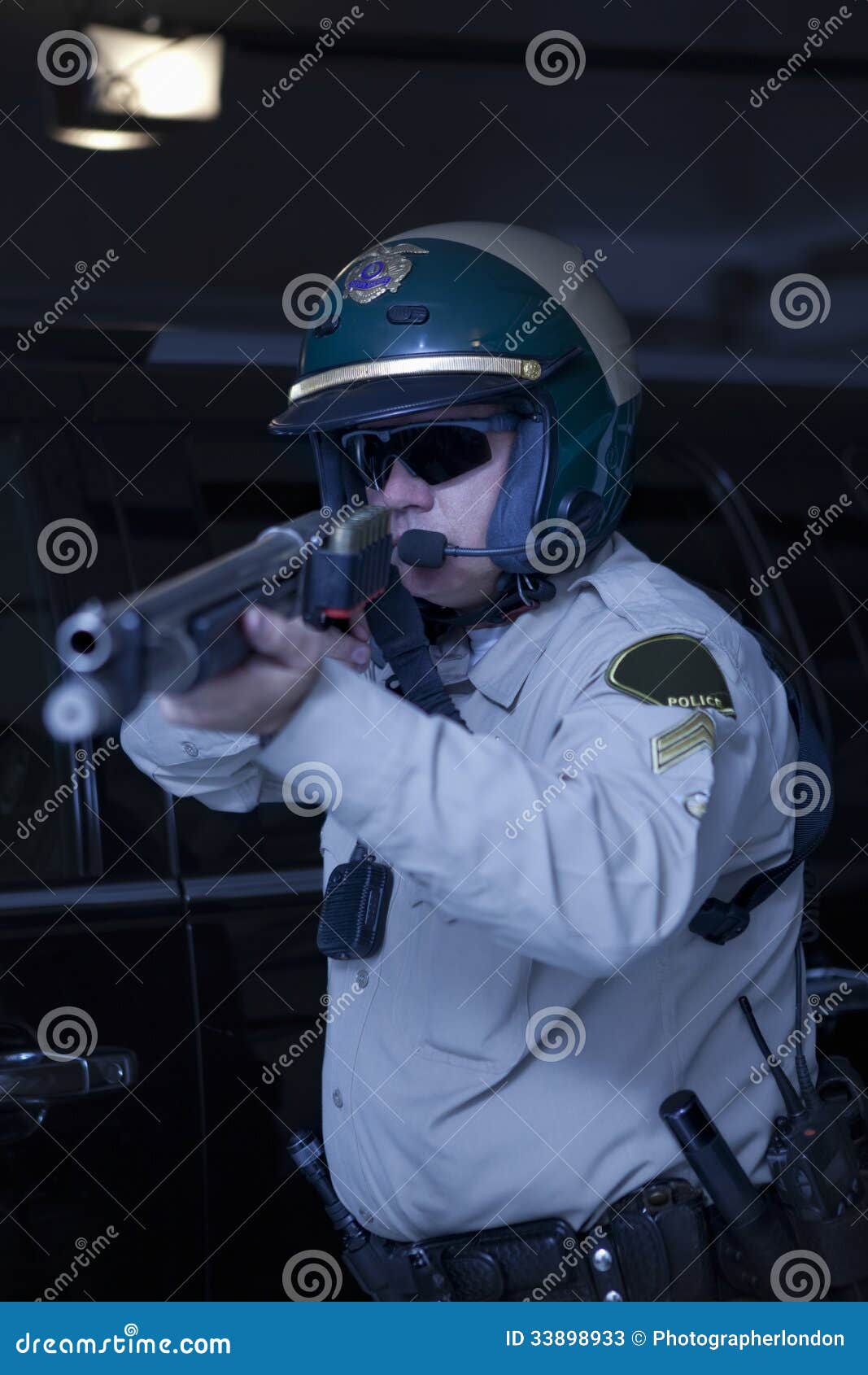 Policeman Aiming Rifle while Standing in Front of Car Stock Image ...