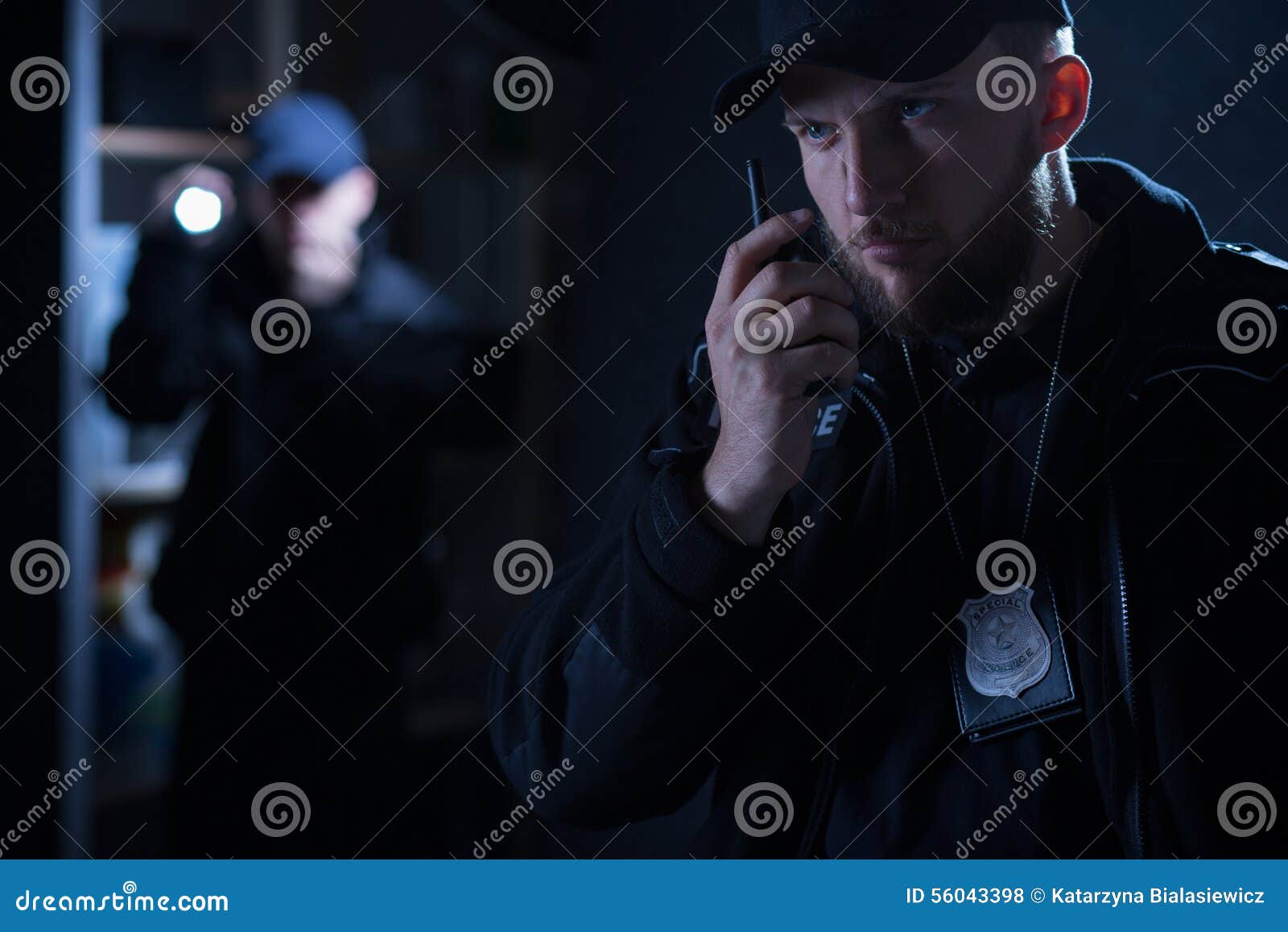 Policeman Calling for Back Up Stock Photo - Image of face, calling ...