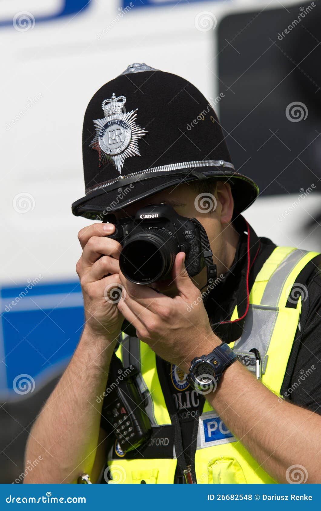 British Policeman Walking Past A Royal Guard At The Entrance To His ...