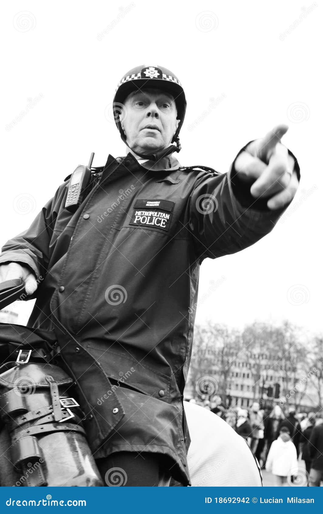 Policeman pointing editorial photography. Image of severe - 18692942