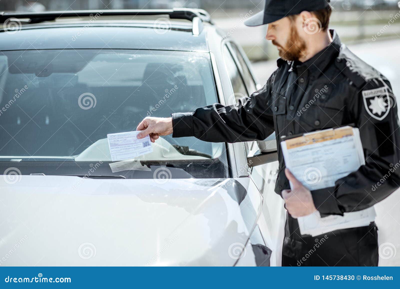 Policeman Putting Fine on the Car Stock Photo - Image of ticket ...