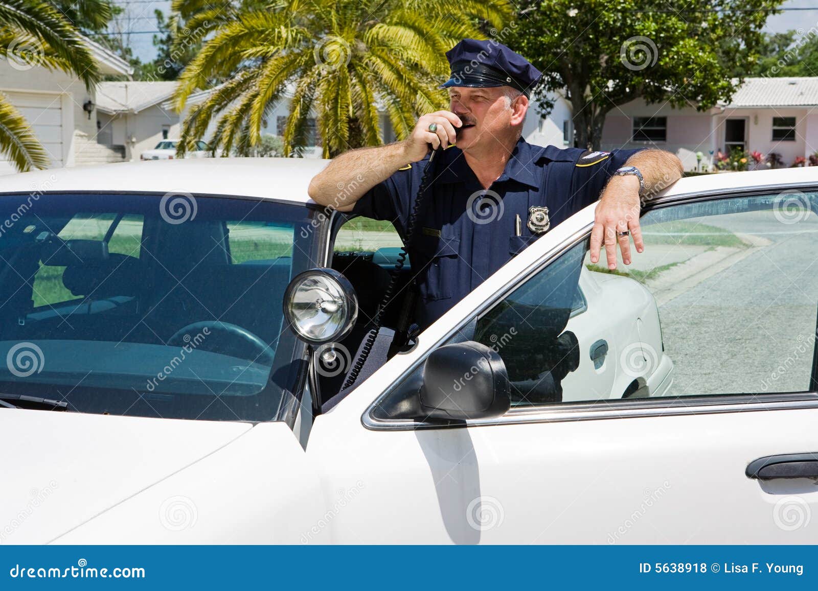Policeman Radioing Headquarters Stock Photo - Image of collar, driver ...