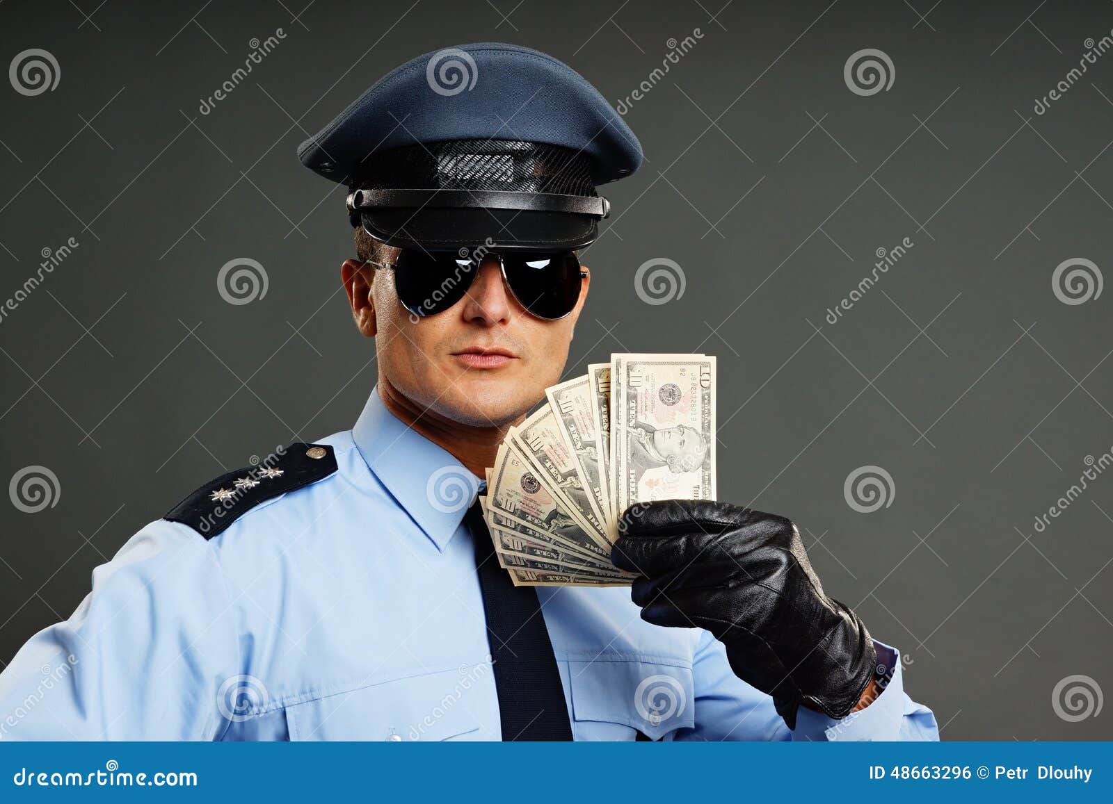 Policeman shows money stock photo. Image of caucasian - 48663296