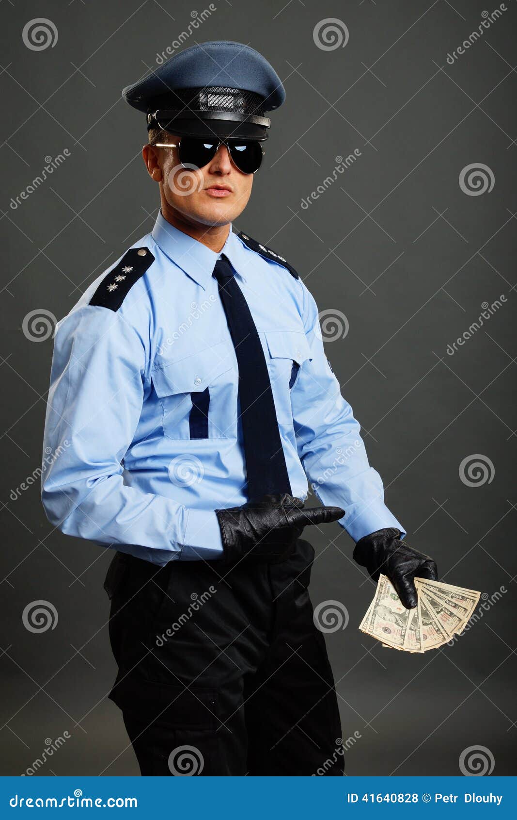 Policeman shows money stock photo. Image of person, caucasian - 41640828