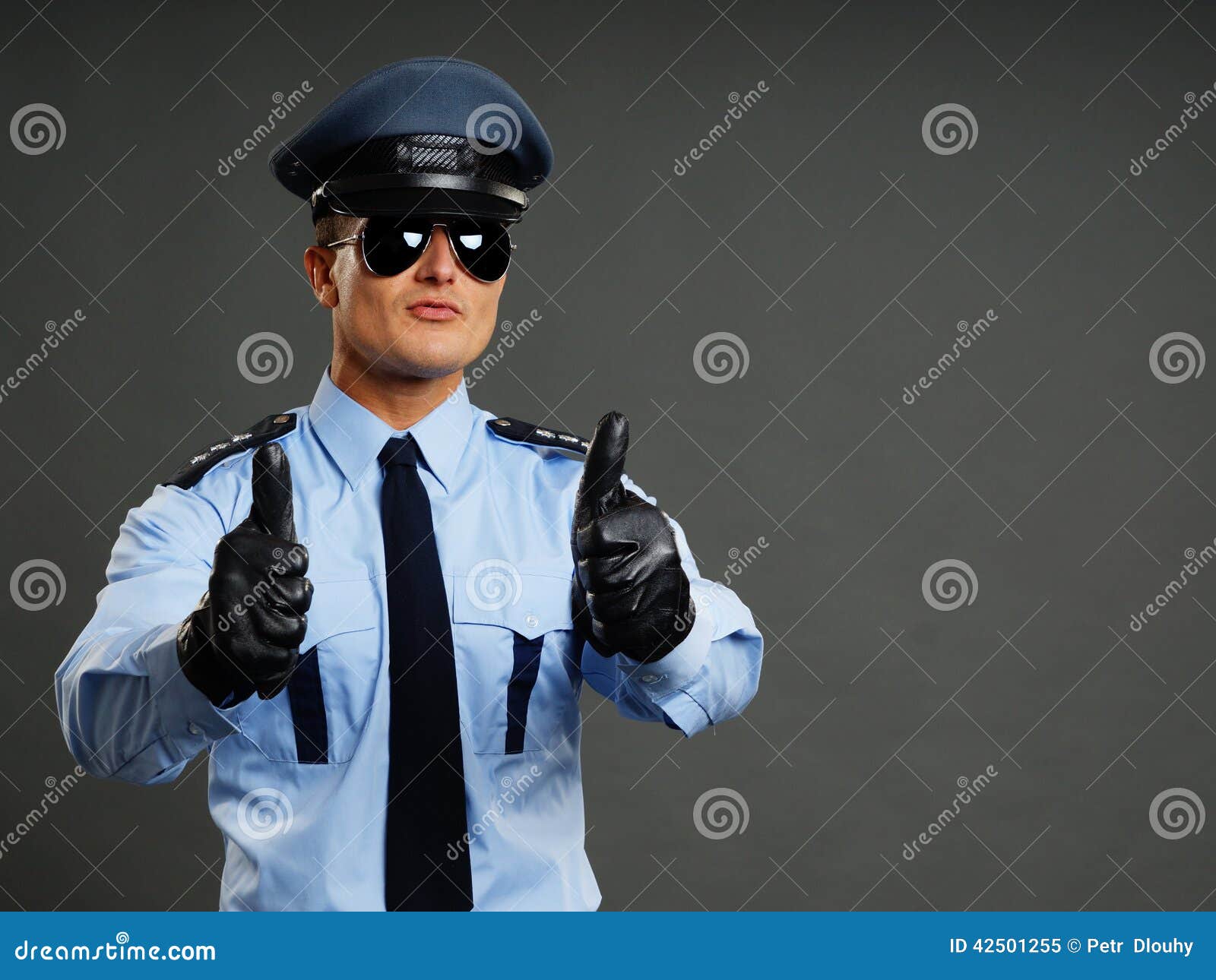 Policeman shows on you stock image. Image of sunglasses - 42501255