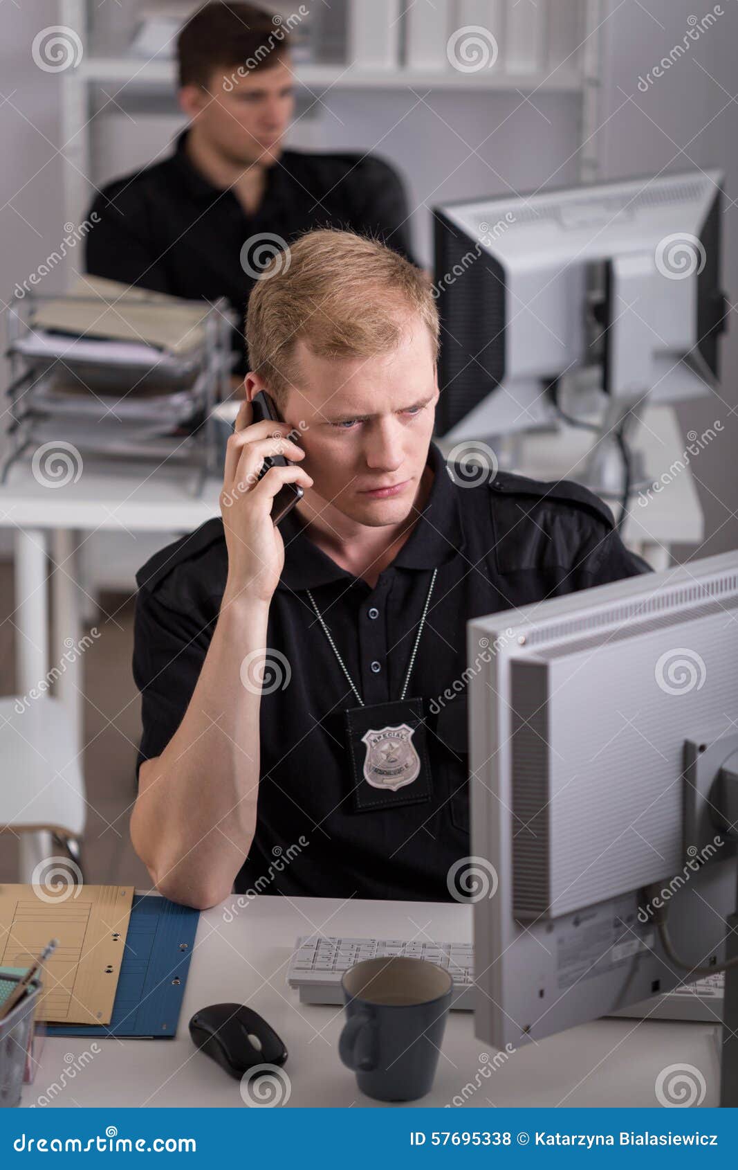 Policeman talking on phone stock photo. Image of duty - 57695338