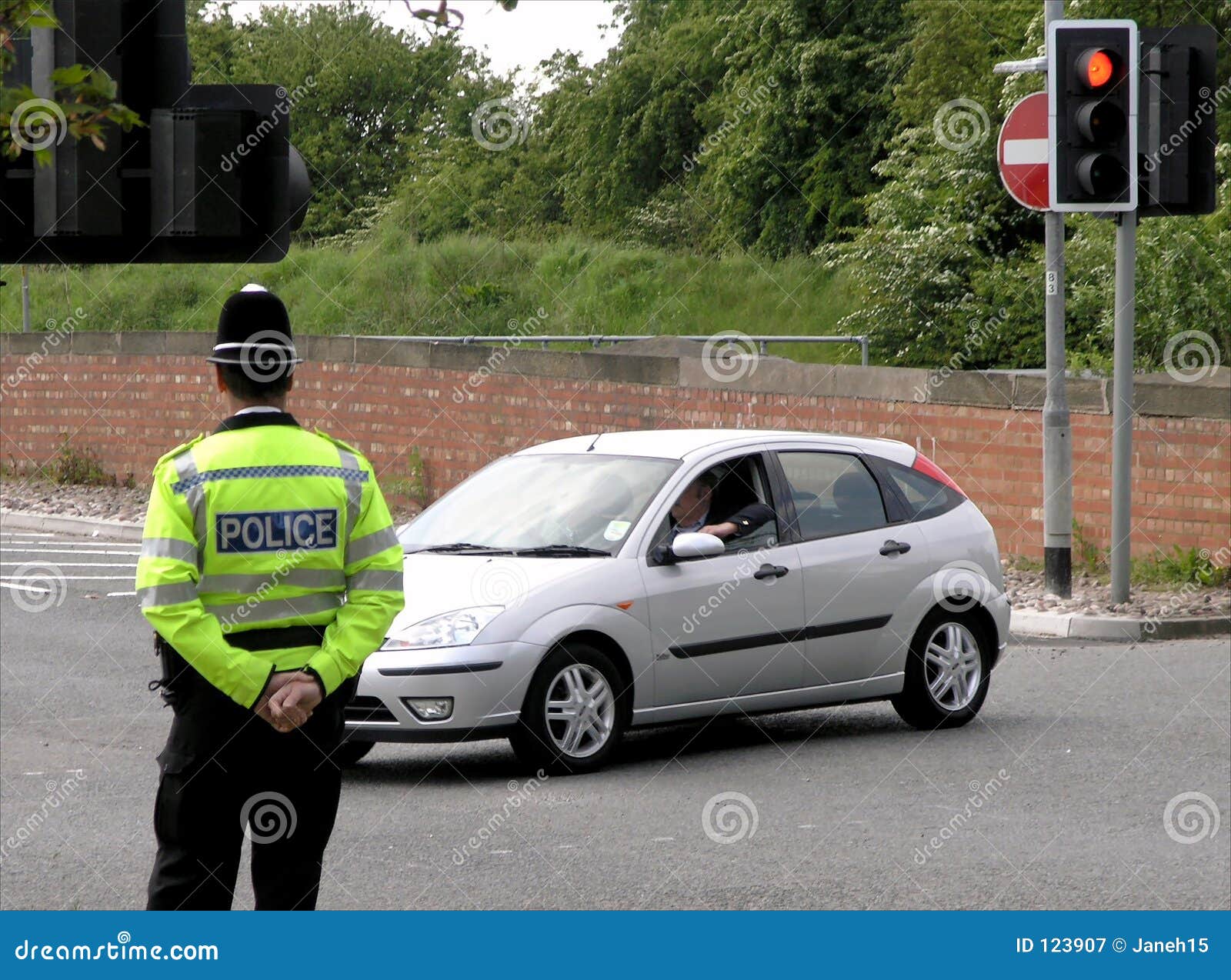 Policeman watching traffic stock image. Image of driving - 123907